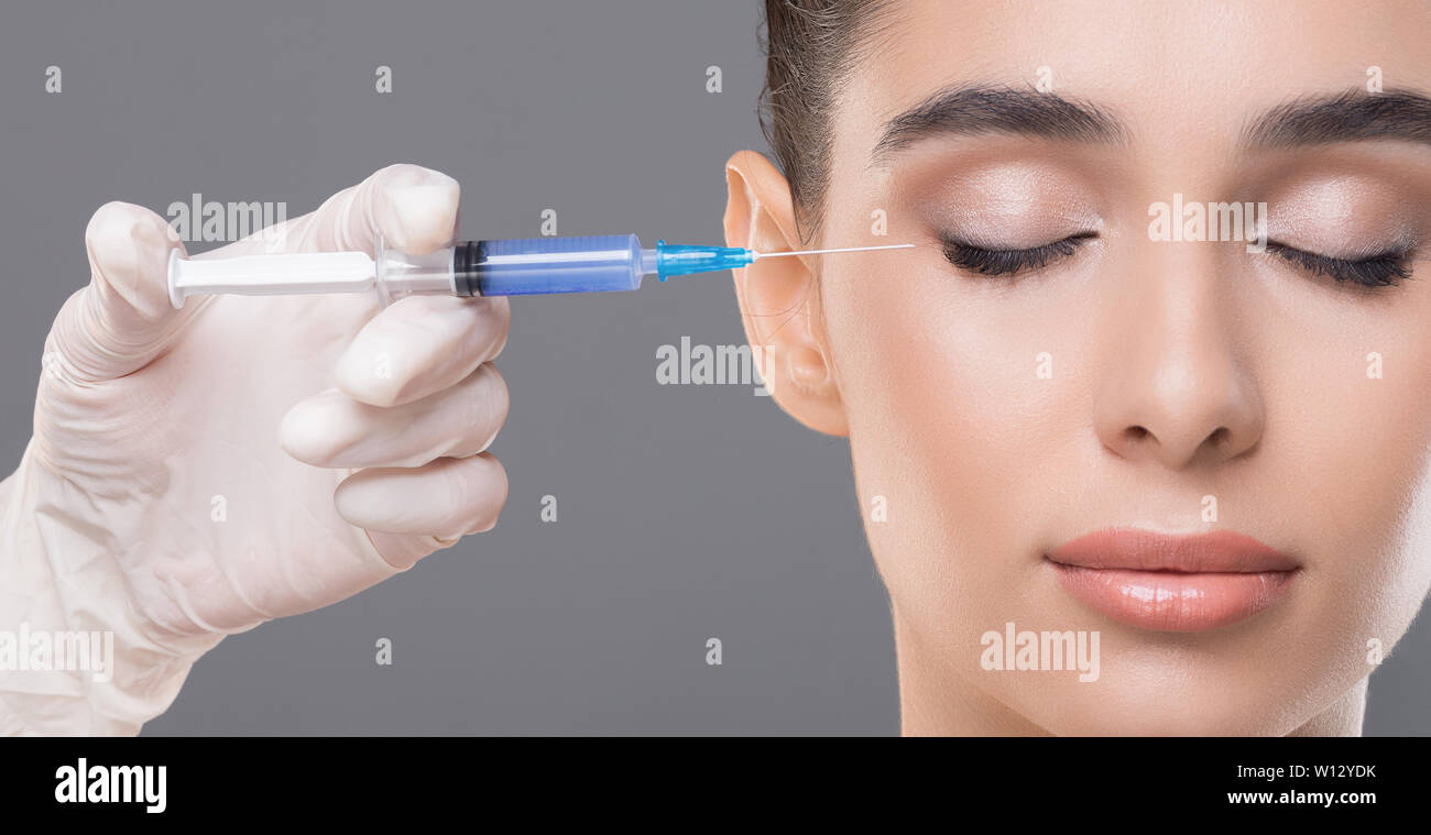 Beautiful woman making plastic surgery procedure for face Stock Photo ...