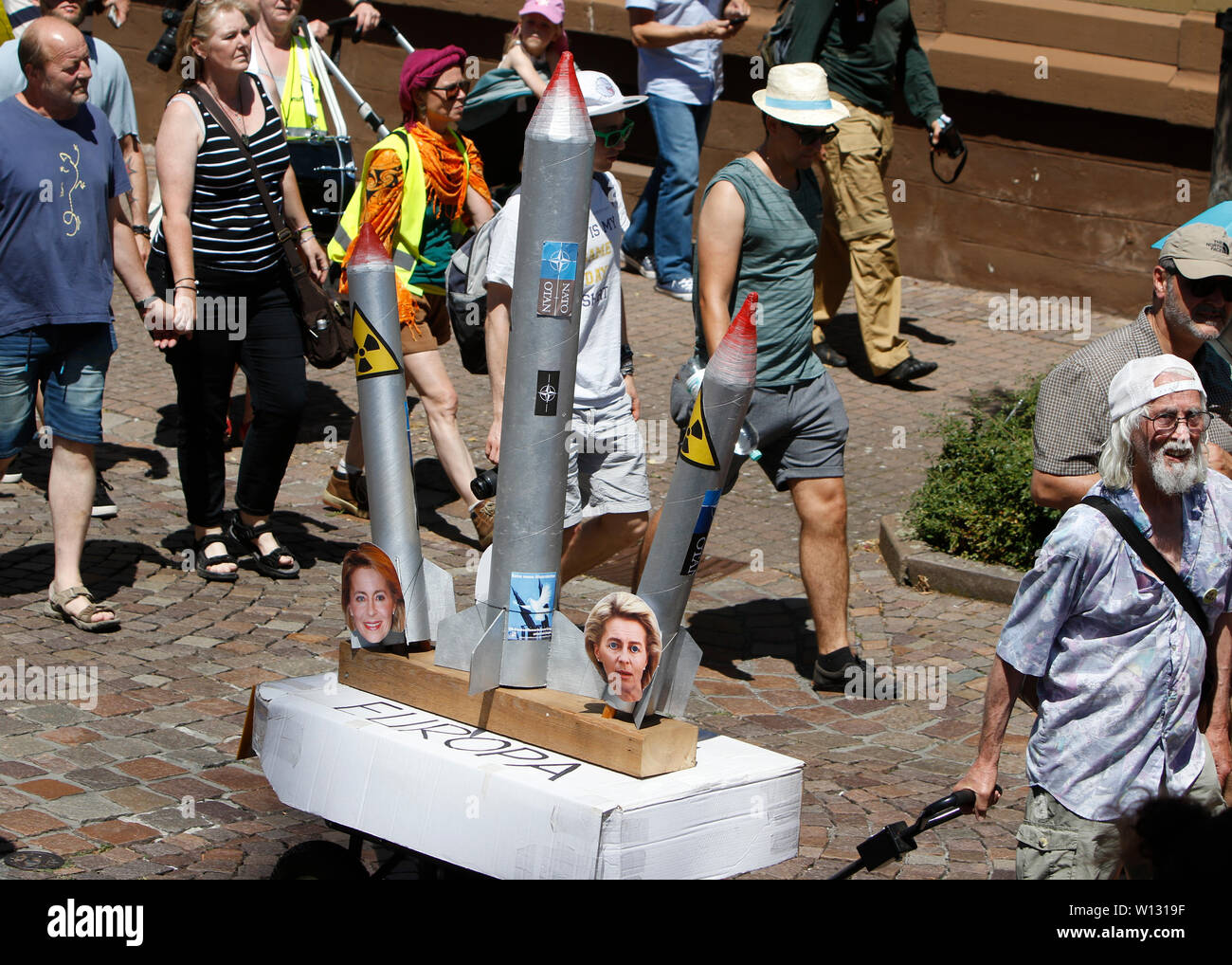 Ramstein, Germany. 29th June, 2019. A Protester pulls a small float ...