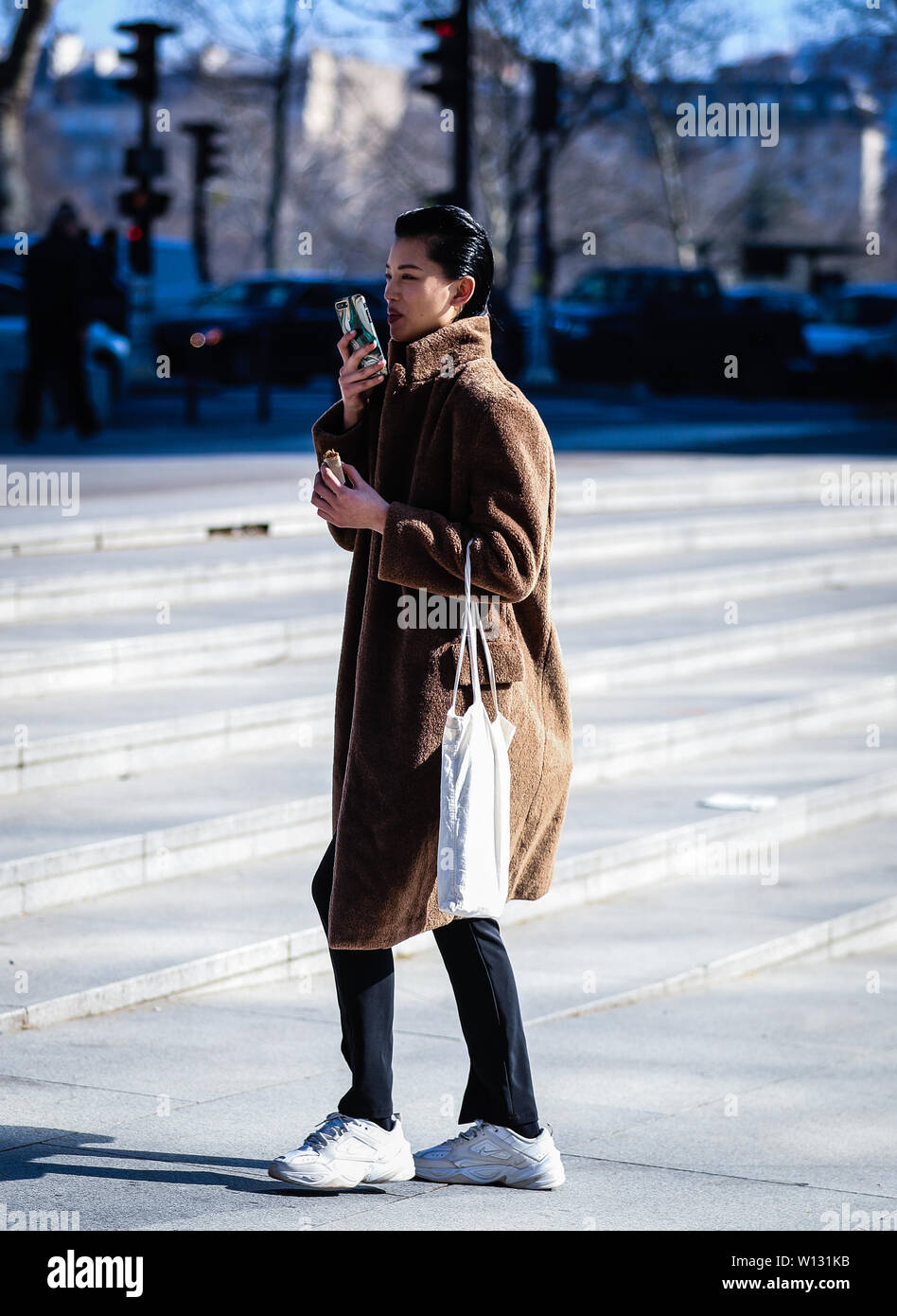 A model on the street during the Paris Fashion Week. (Photo by Mauro ...