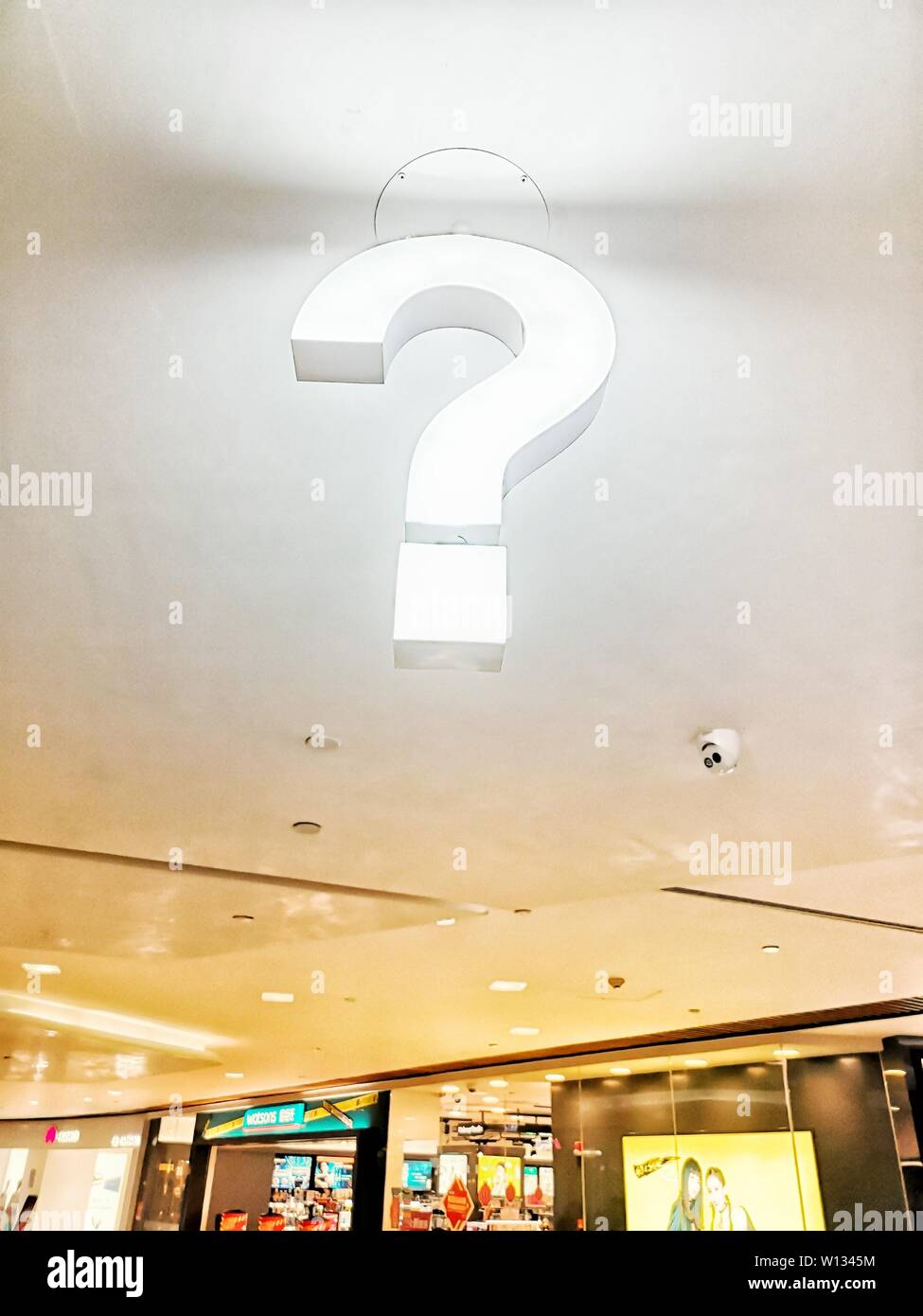 The question mark at the mall information office Stock Photo - Alamy
