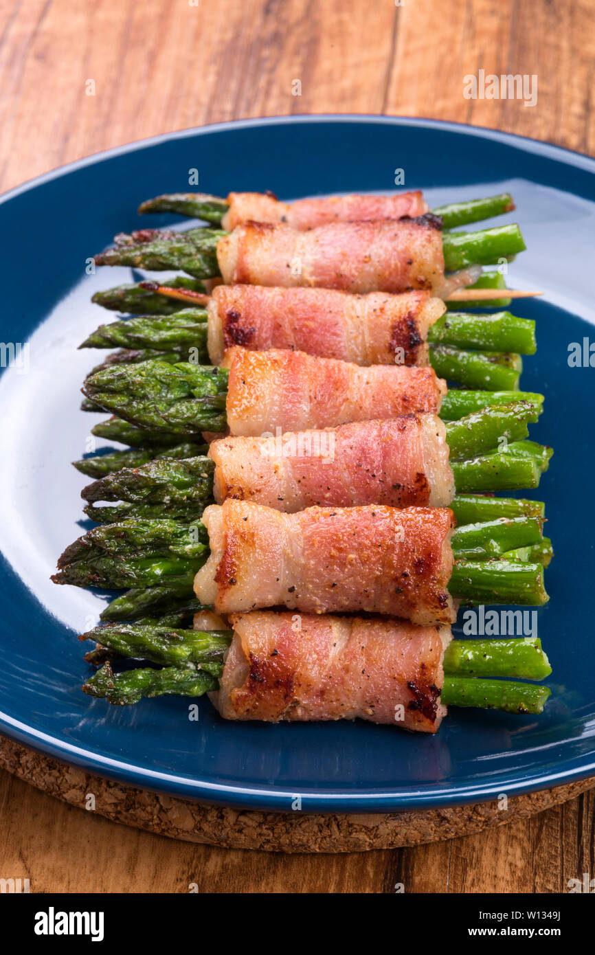 Bacon asparagus roll Stock Photo - Alamy