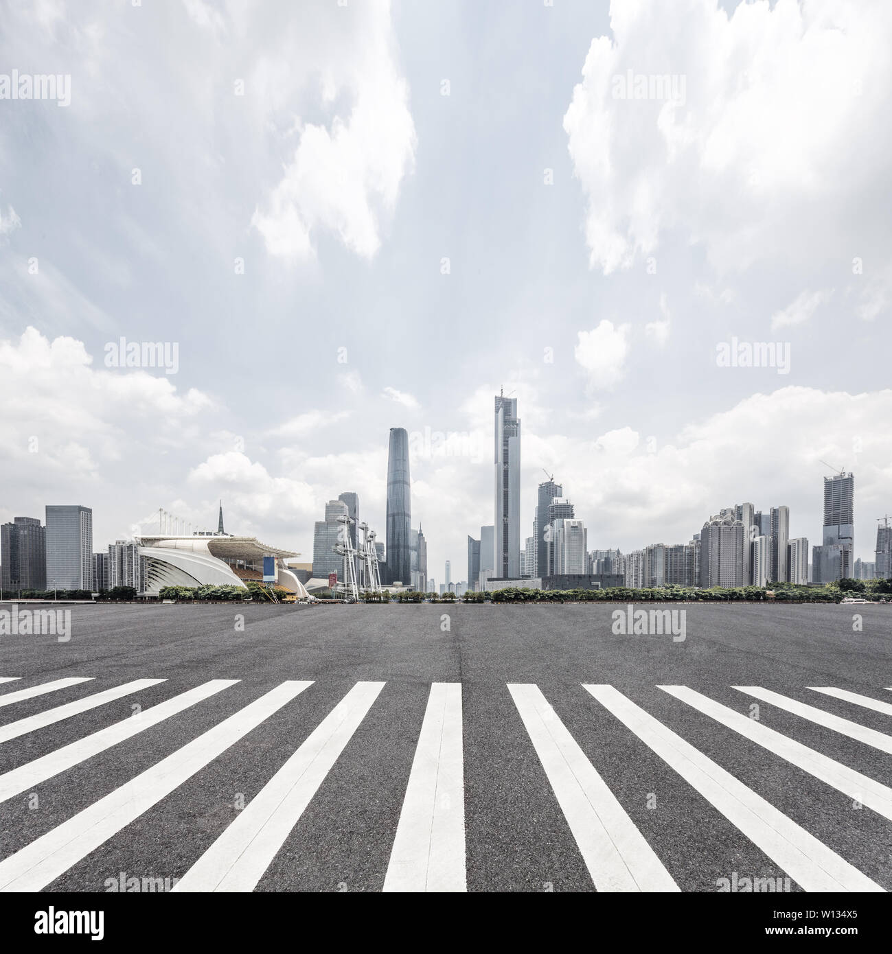 empty road with zebra crossing and skyscrapers Stock Photo - Alamy