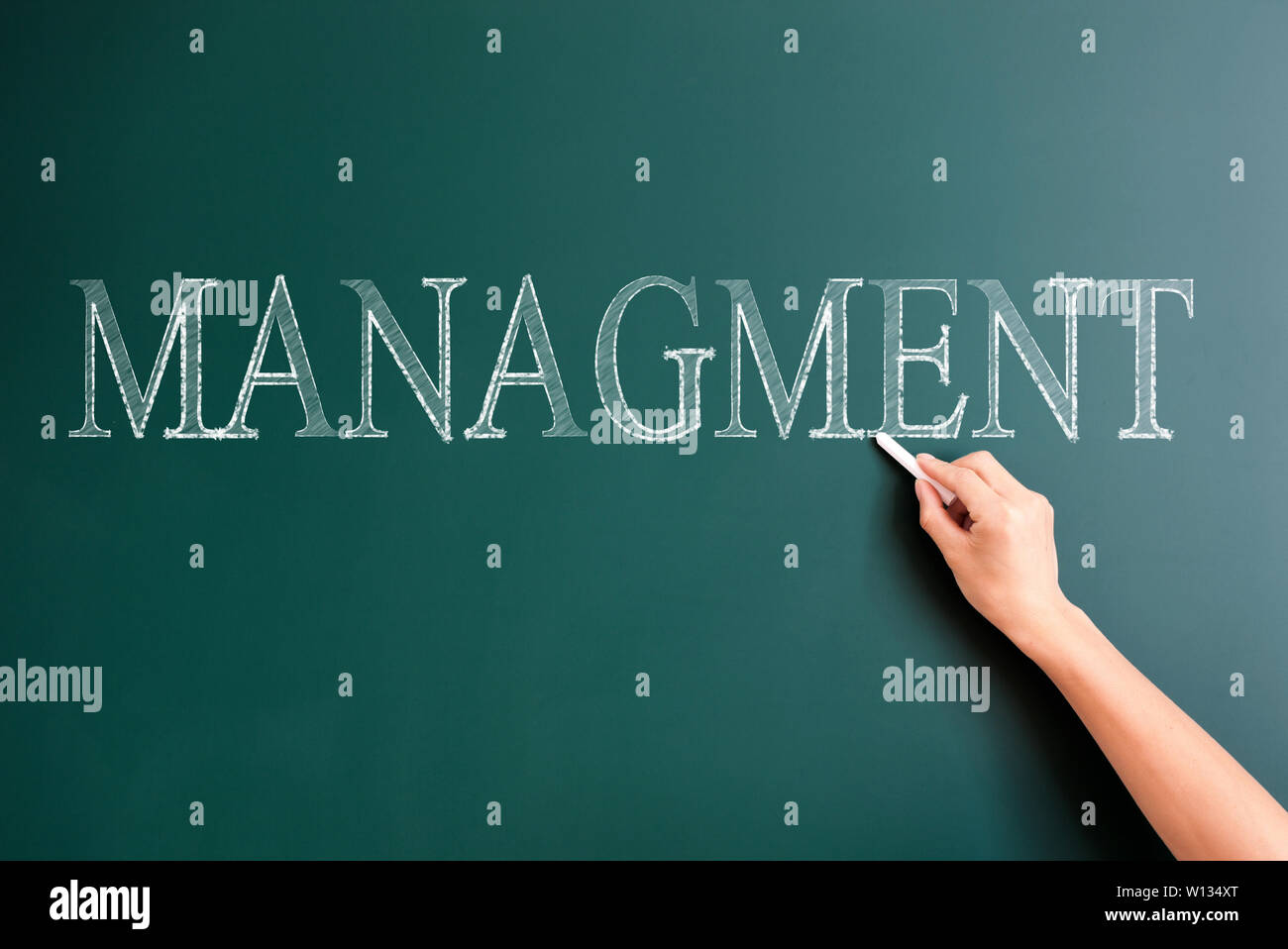 Management written on blackboard Stock Photo - Alamy