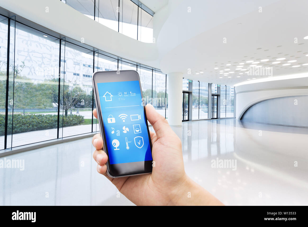 smart phone with smart home with modern hall Stock Photo - Alamy