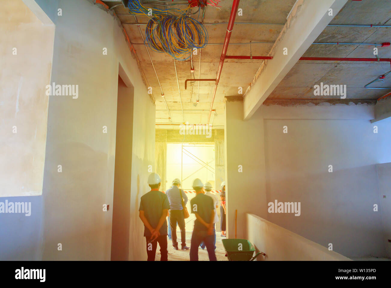 interior in construction and wall decoration at building site with ...