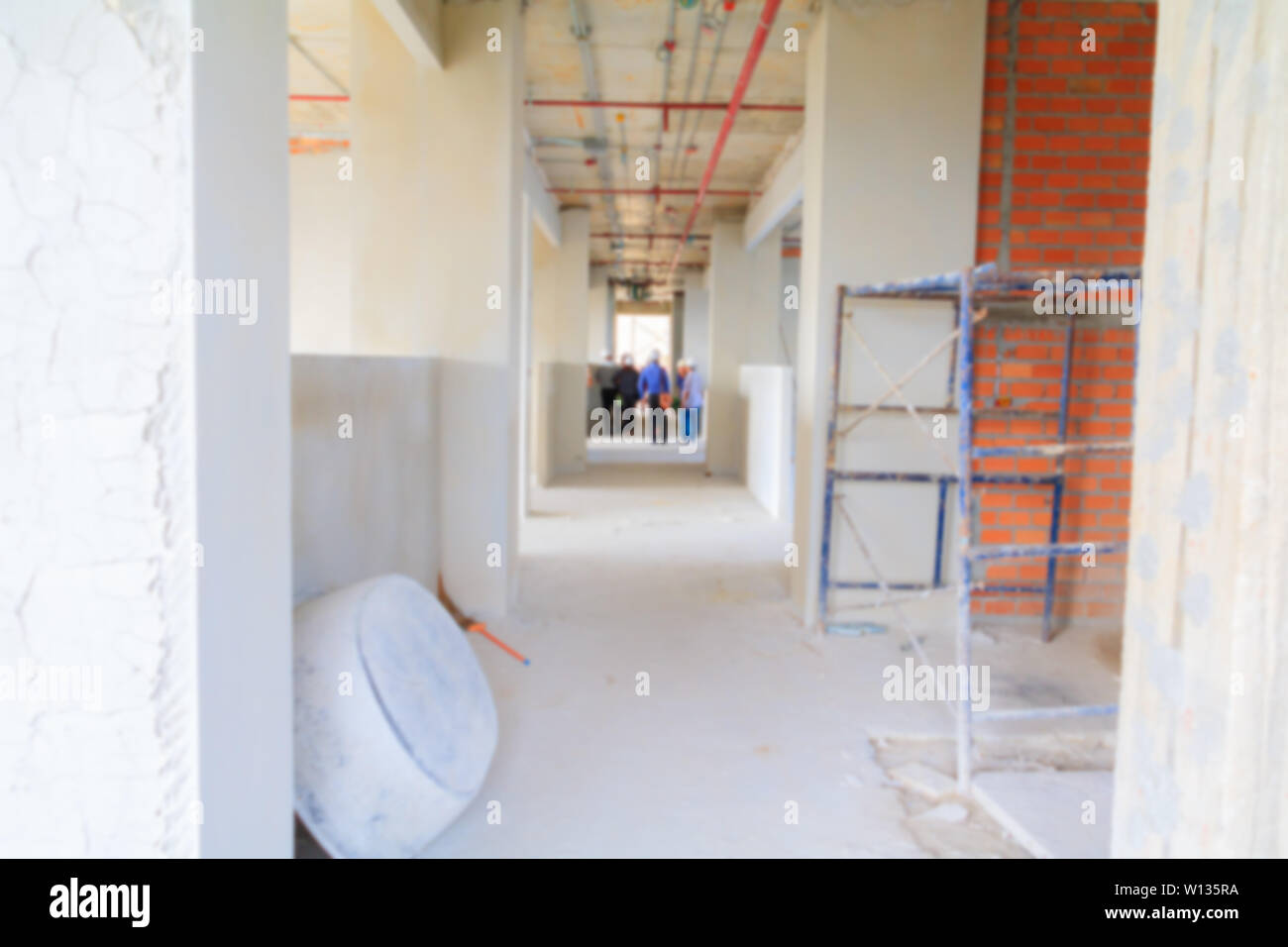 blur interior in construction and wall decoration at building site with ...
