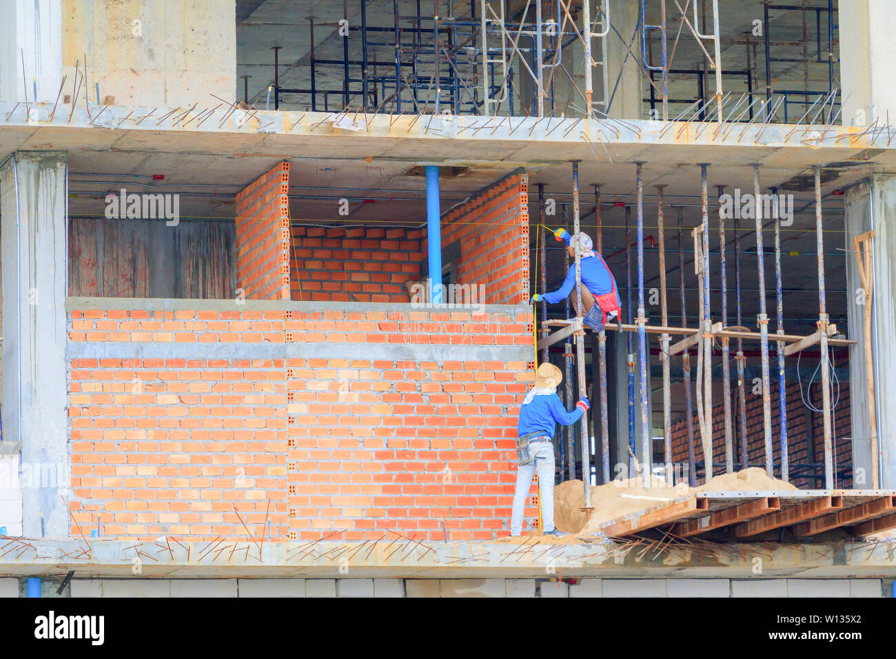 construction workers building develop of housing at laborer work ...