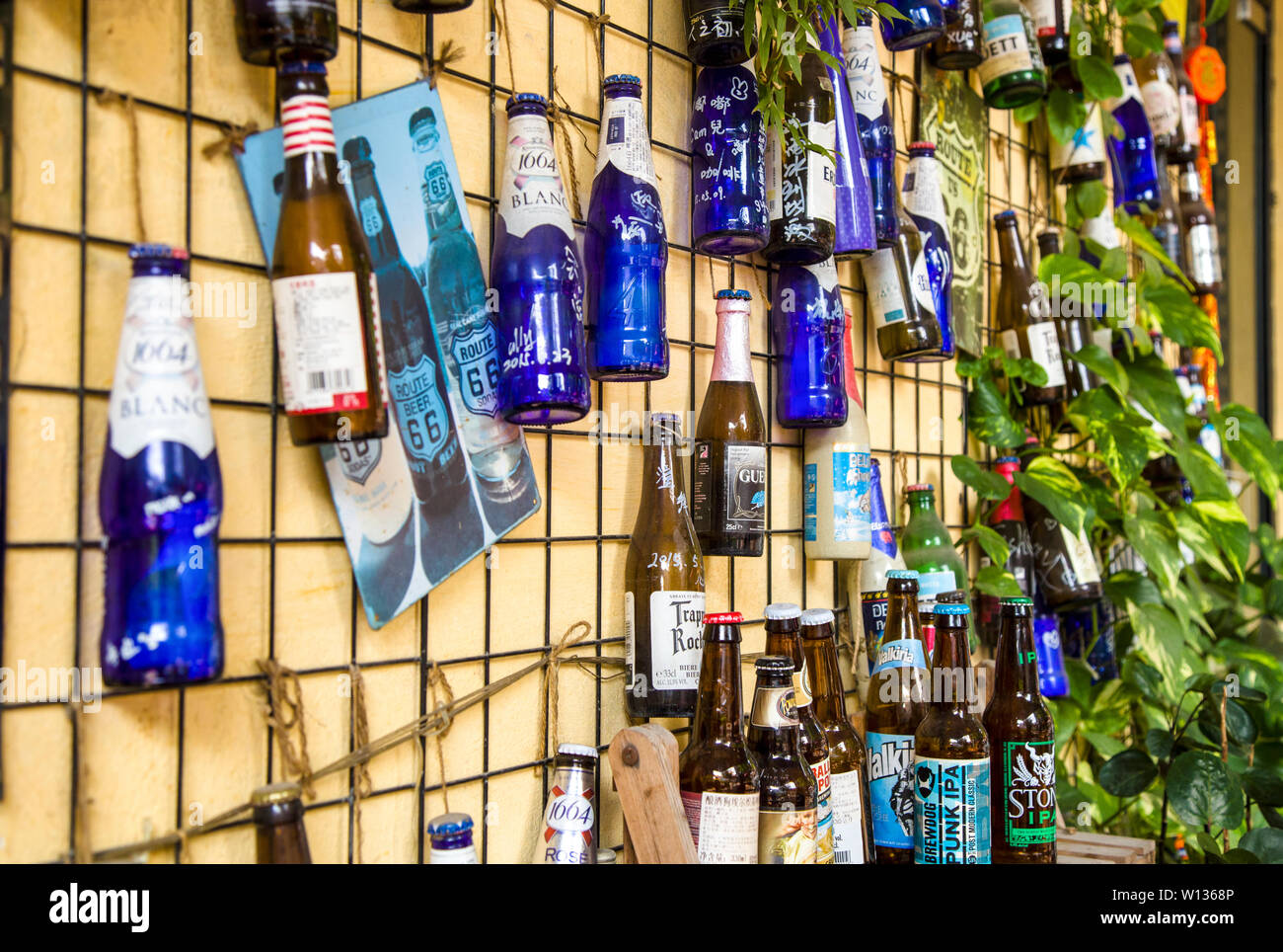 Beer bottle wall Stock Photo - Alamy