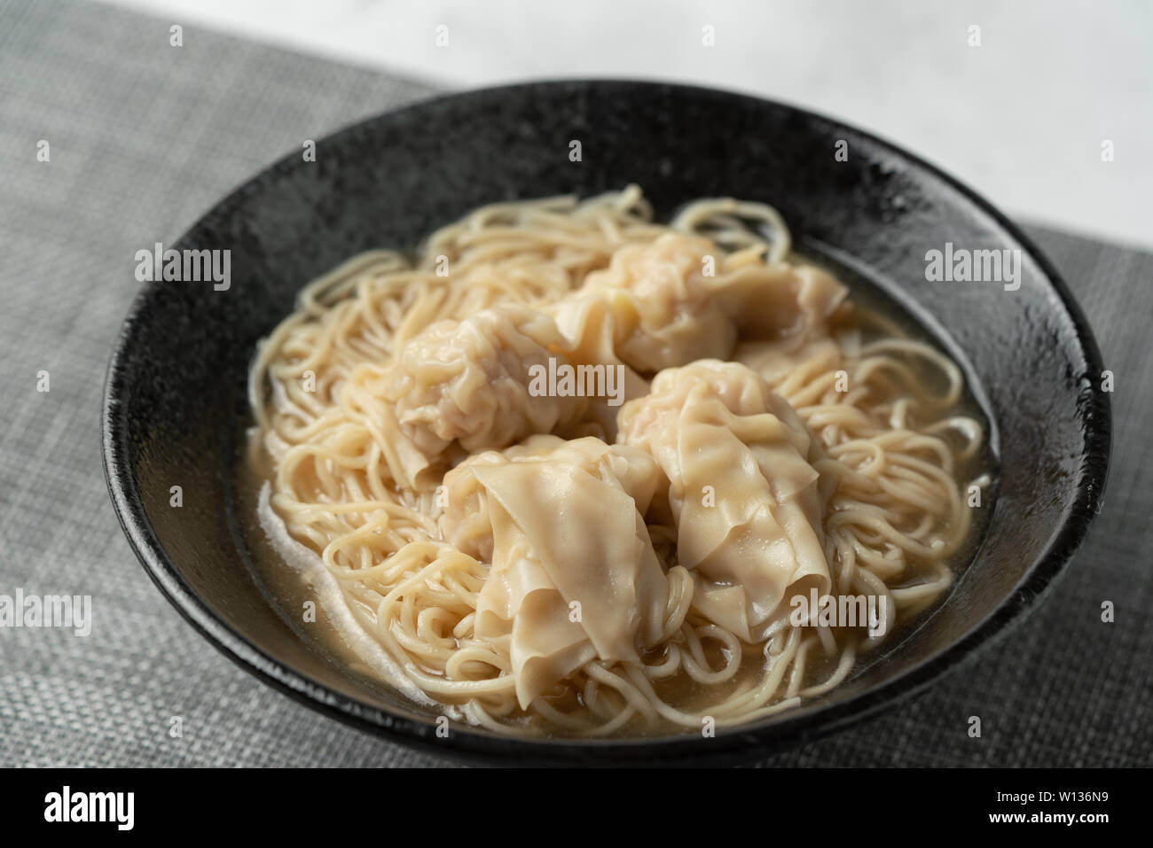 Cloud noodles on a marble table Stock Photo - Alamy
