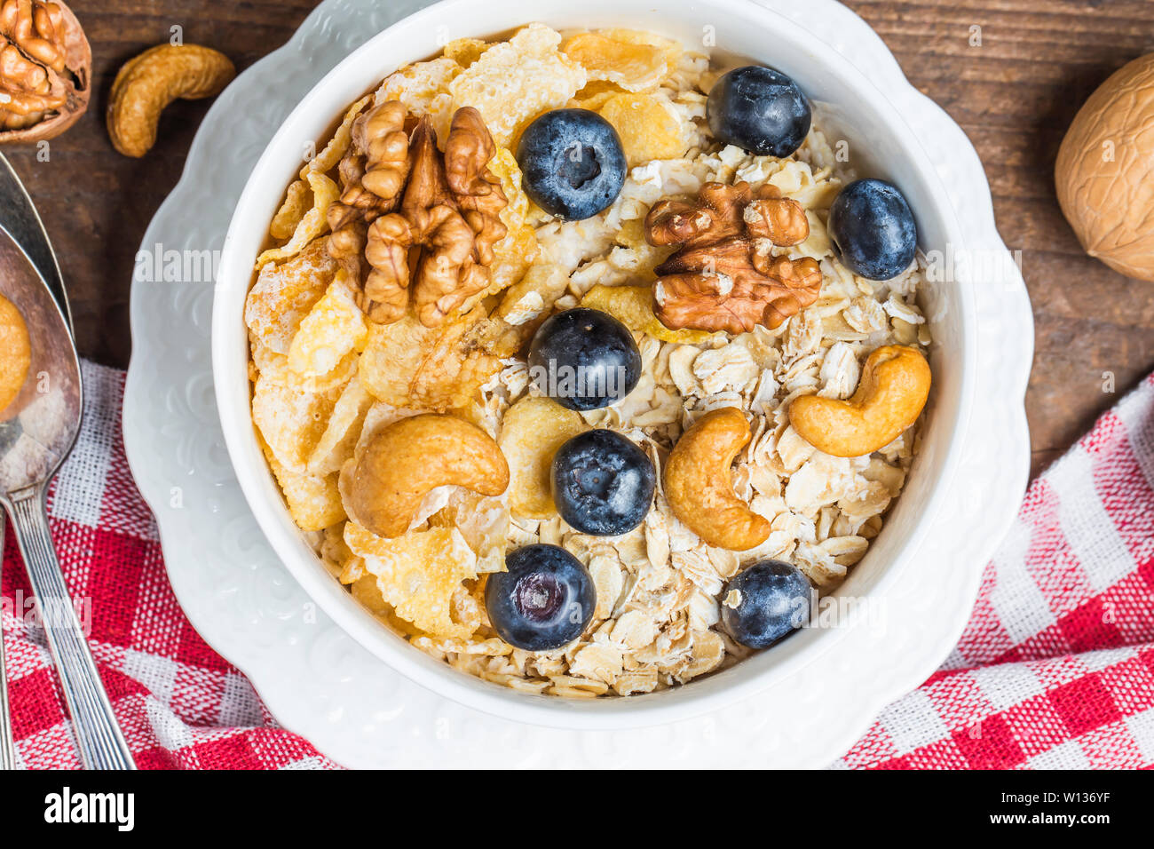 Fruit, nut, oatmeal breakfast Stock Photo - Alamy