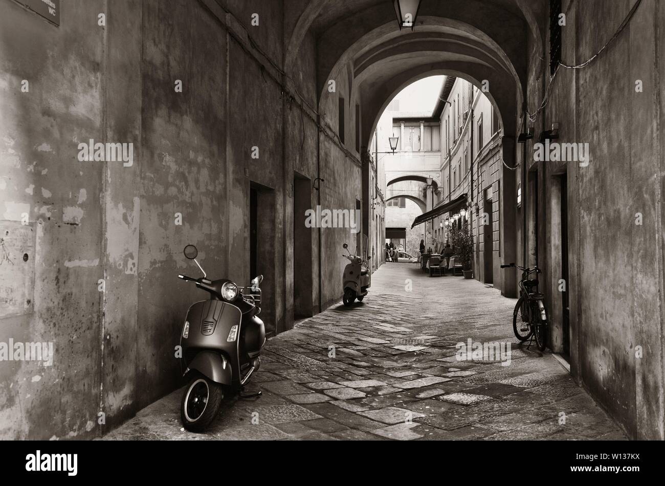 Street view with old buildings and archive in Siena Stock Photo - Alamy