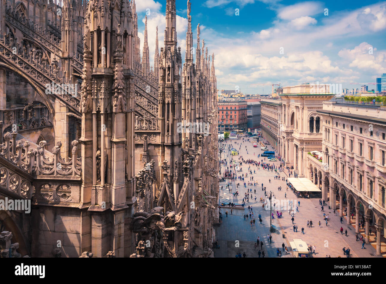 View of people enjoying Piazza del Duomo with the ornate architecture ...