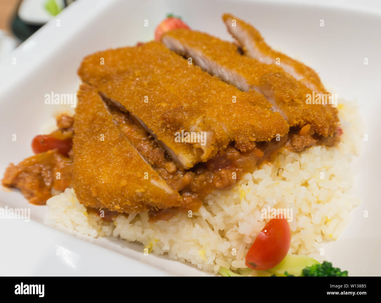 Chicken with rice Stock Photo - Alamy