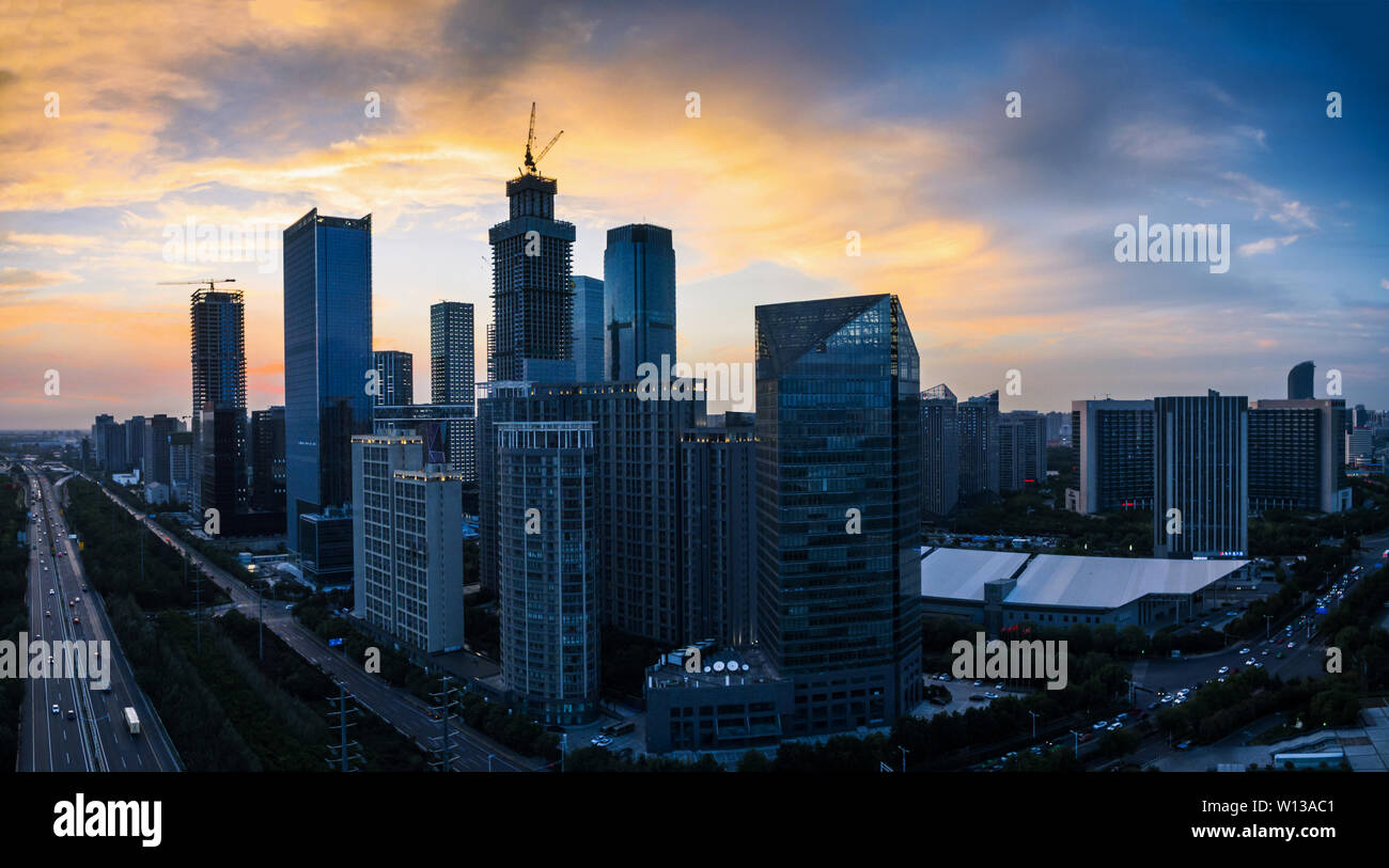 Dusk city architecture Stock Photo - Alamy