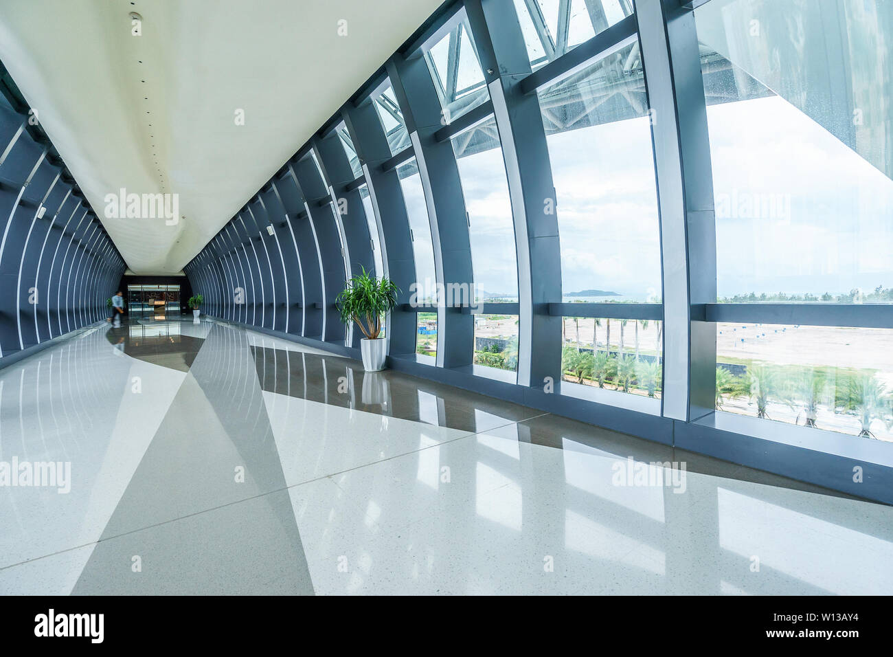 corridor with many glass windows in modern shopping mall Stock Photo ...