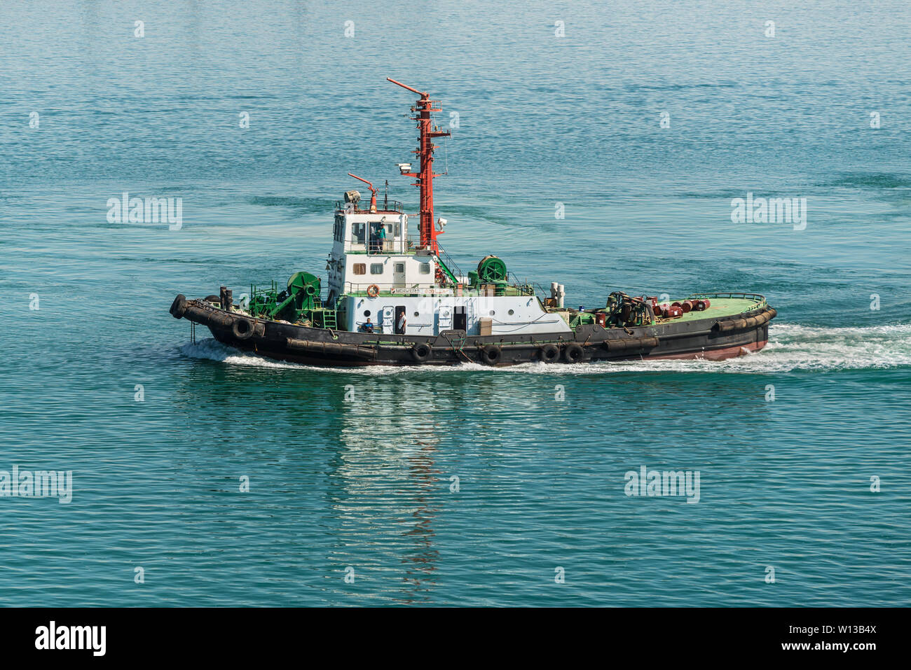 Suez, Egypt - November 5, 2017: Tug Moawen 5 passing the New Suez Canal ...