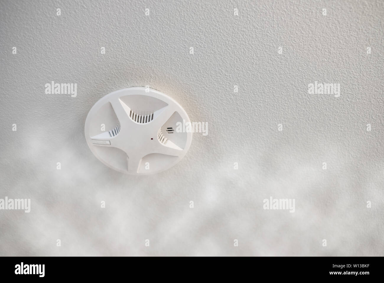 Install fire alarm signal protection on ceiling with smoke effect in ...