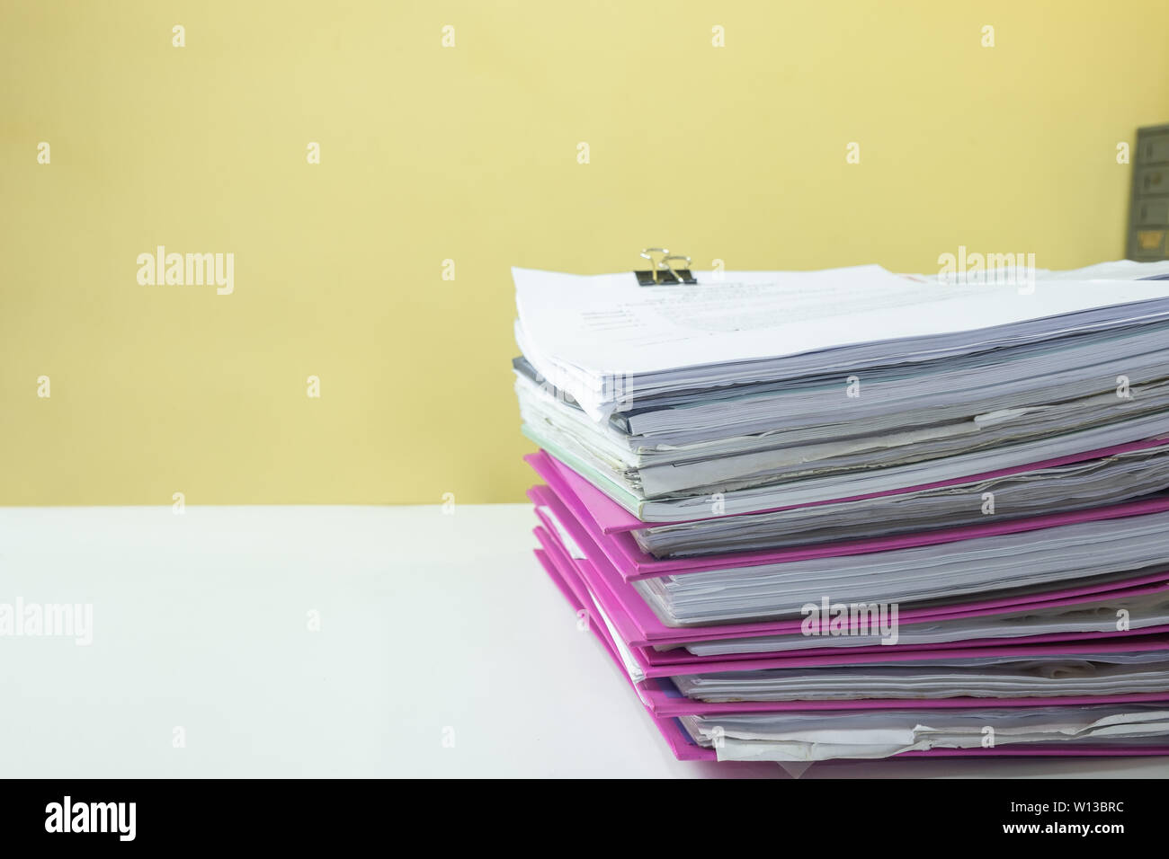 Stack of accounting documents on white desk in office Stock Photo - Alamy
