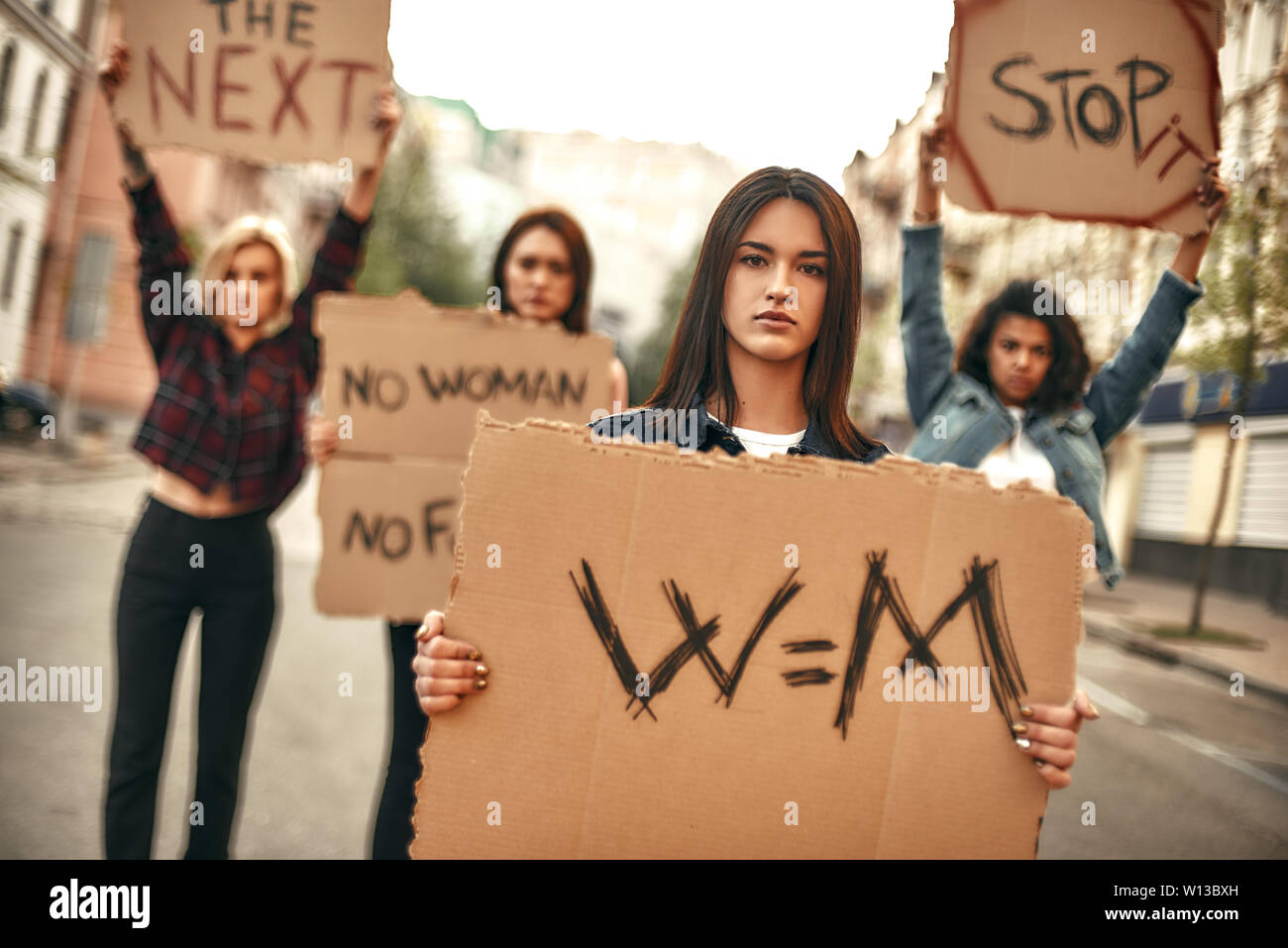 Marching holding walking demonstration banner road hi-res stock ...
