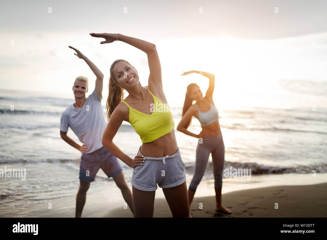 Group beach fitness hi-res stock photography and images - Alamy
