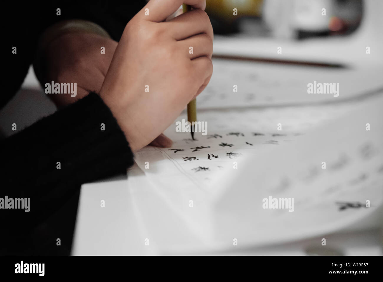 Hand writing brush words Stock Photo - Alamy