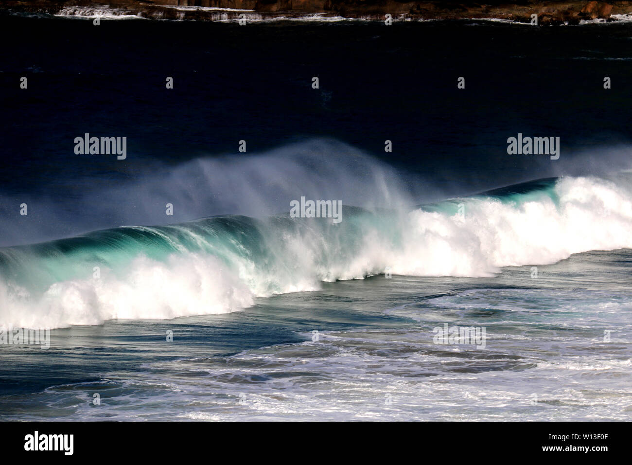 Clear blue ocean churning waves hi-res stock photography and images - Alamy