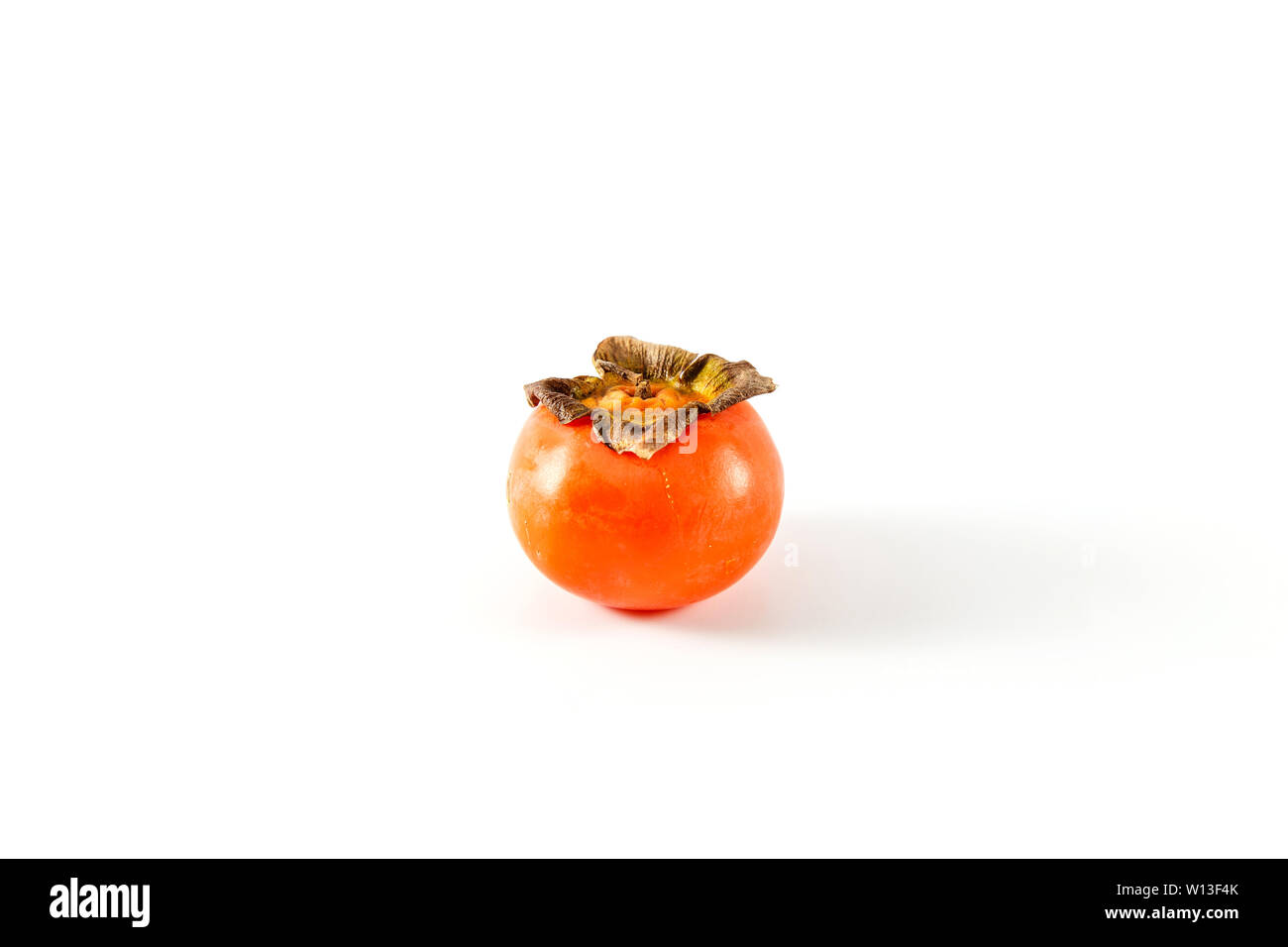 Photographed persimmon in white background Stock Photo - Alamy