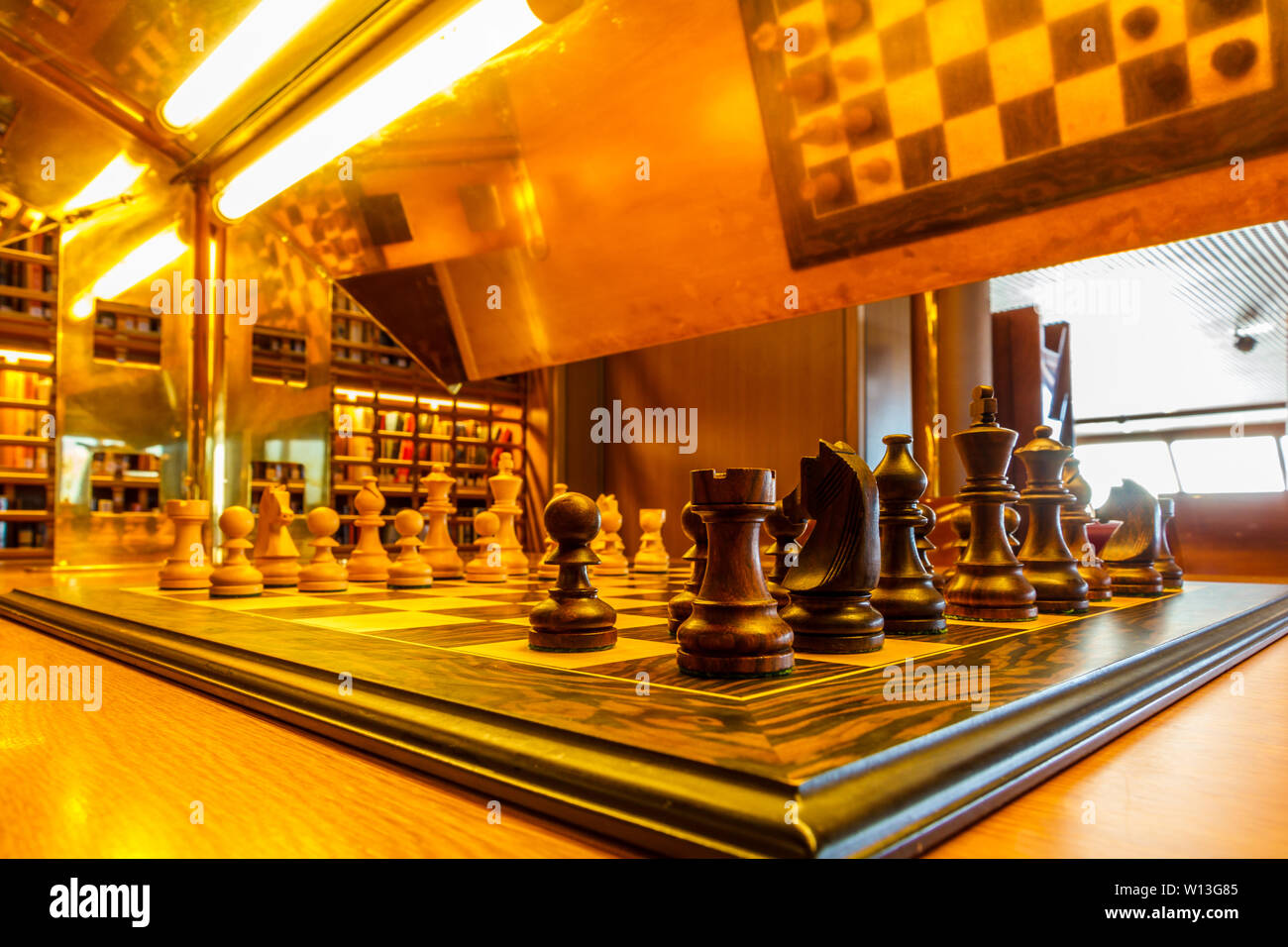 Chess set in a cruise ship library Stock Photo - Alamy