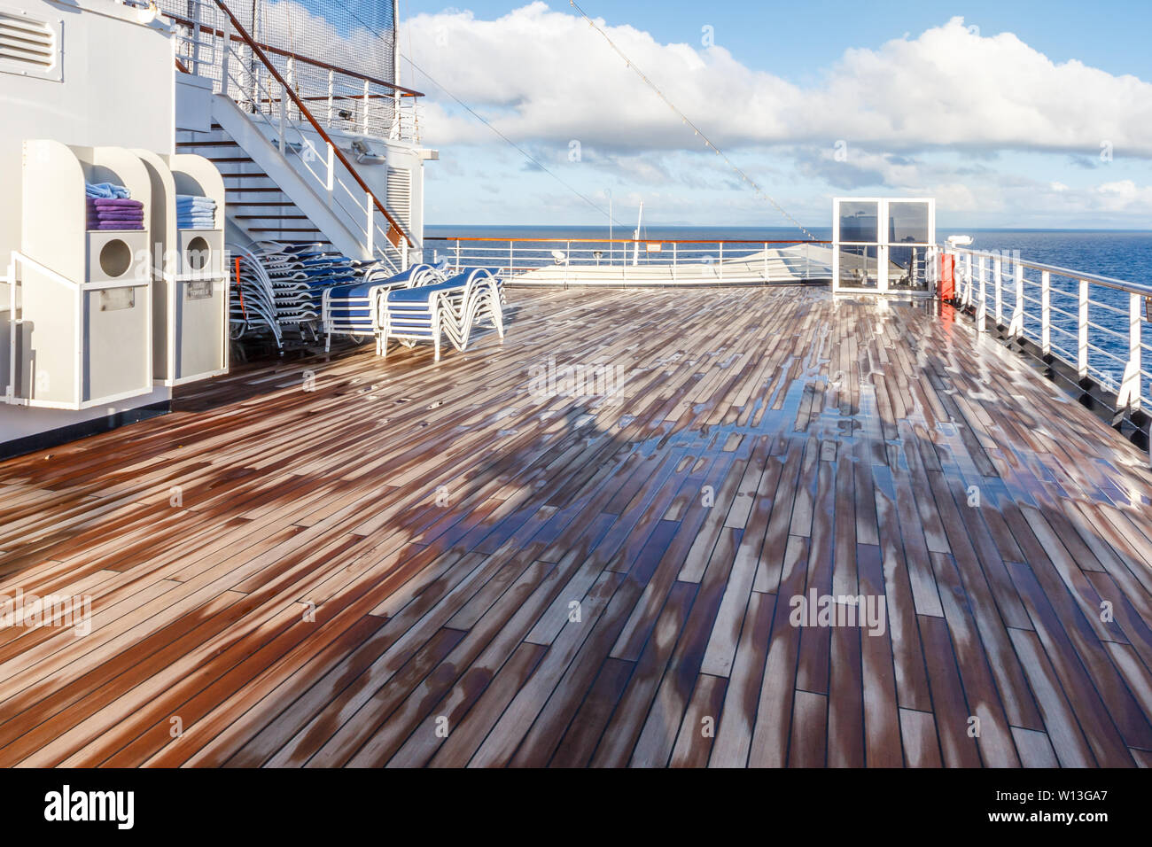Washed down teak deck of a cruise ship in the South Pacific Stock Photo ...