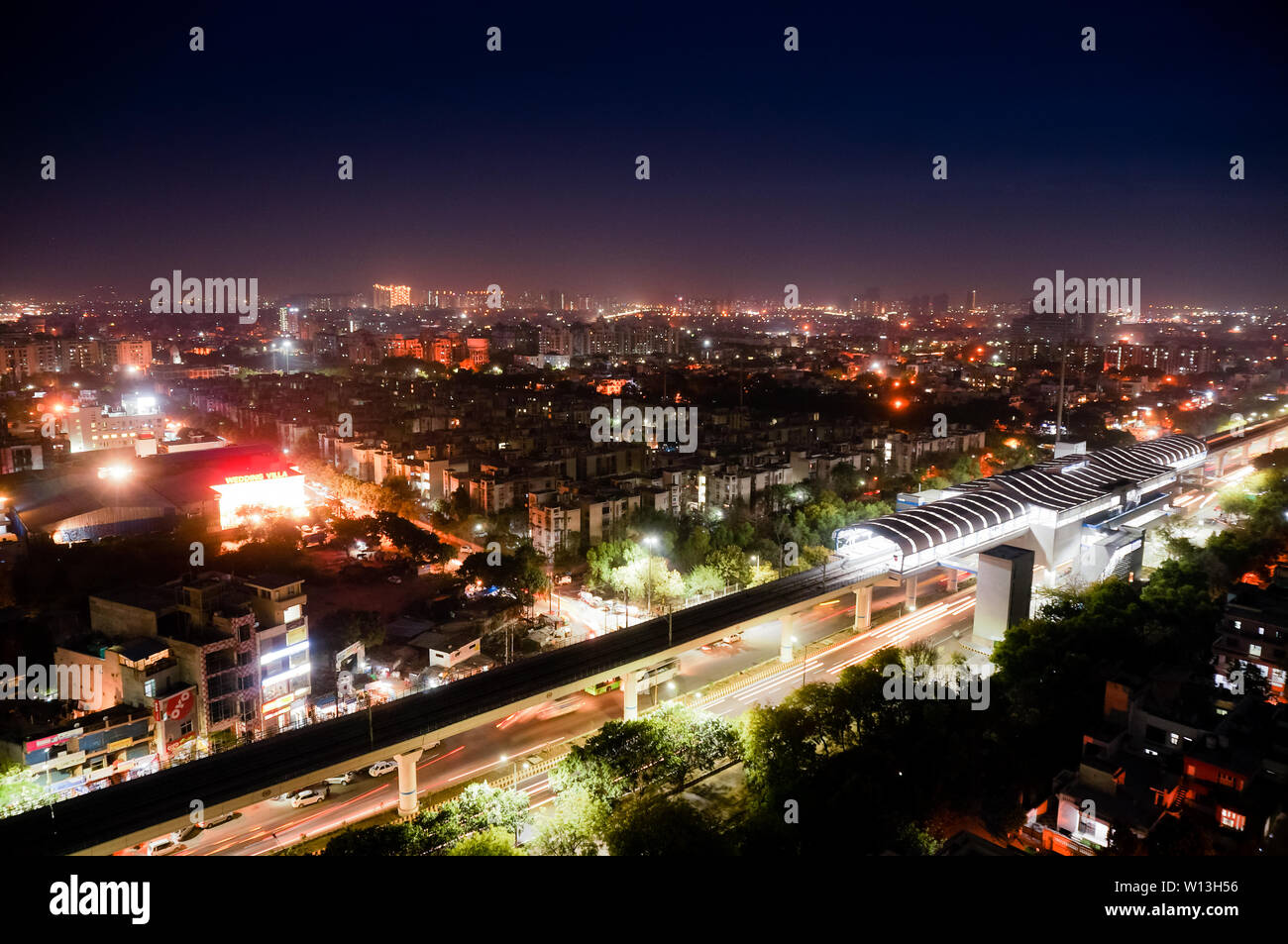 aerial shot of the cityscape in Noida, Gurgaon, Delhi, Mumbai ...
