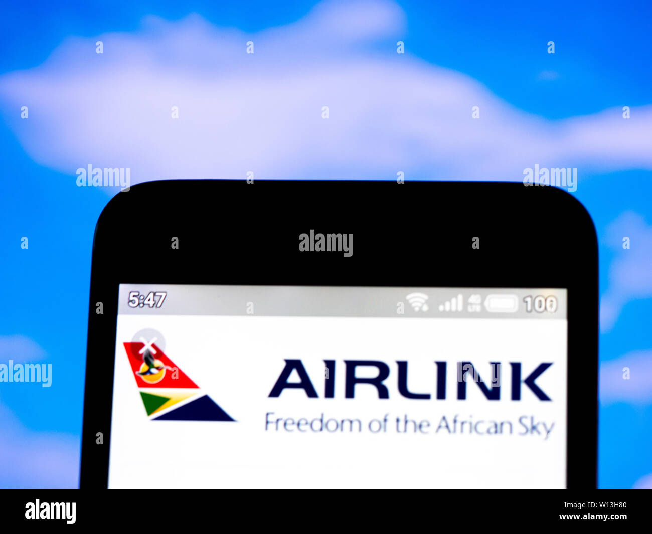 In this photo illustration the Fly AirLink logo is seen displayed on a ...