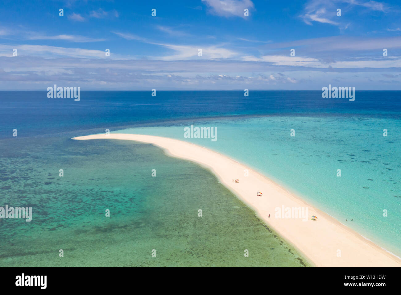 Sand beach island on a coral reef, top view. Atoll with an island of ...