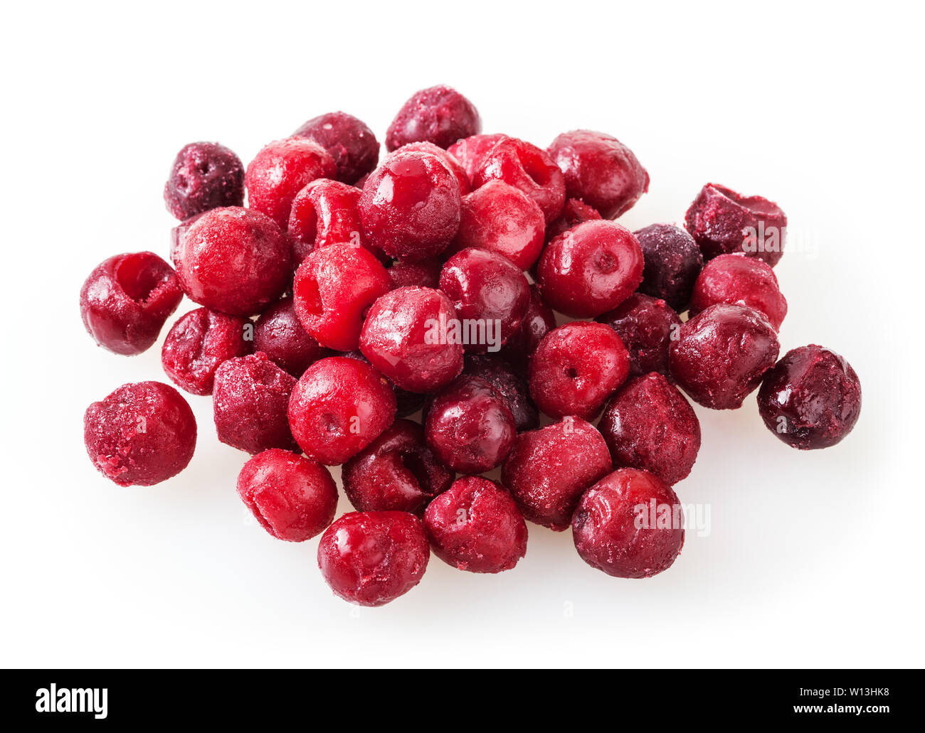 Heap of frozen cherry berries isolated on white background Stock Photo ...