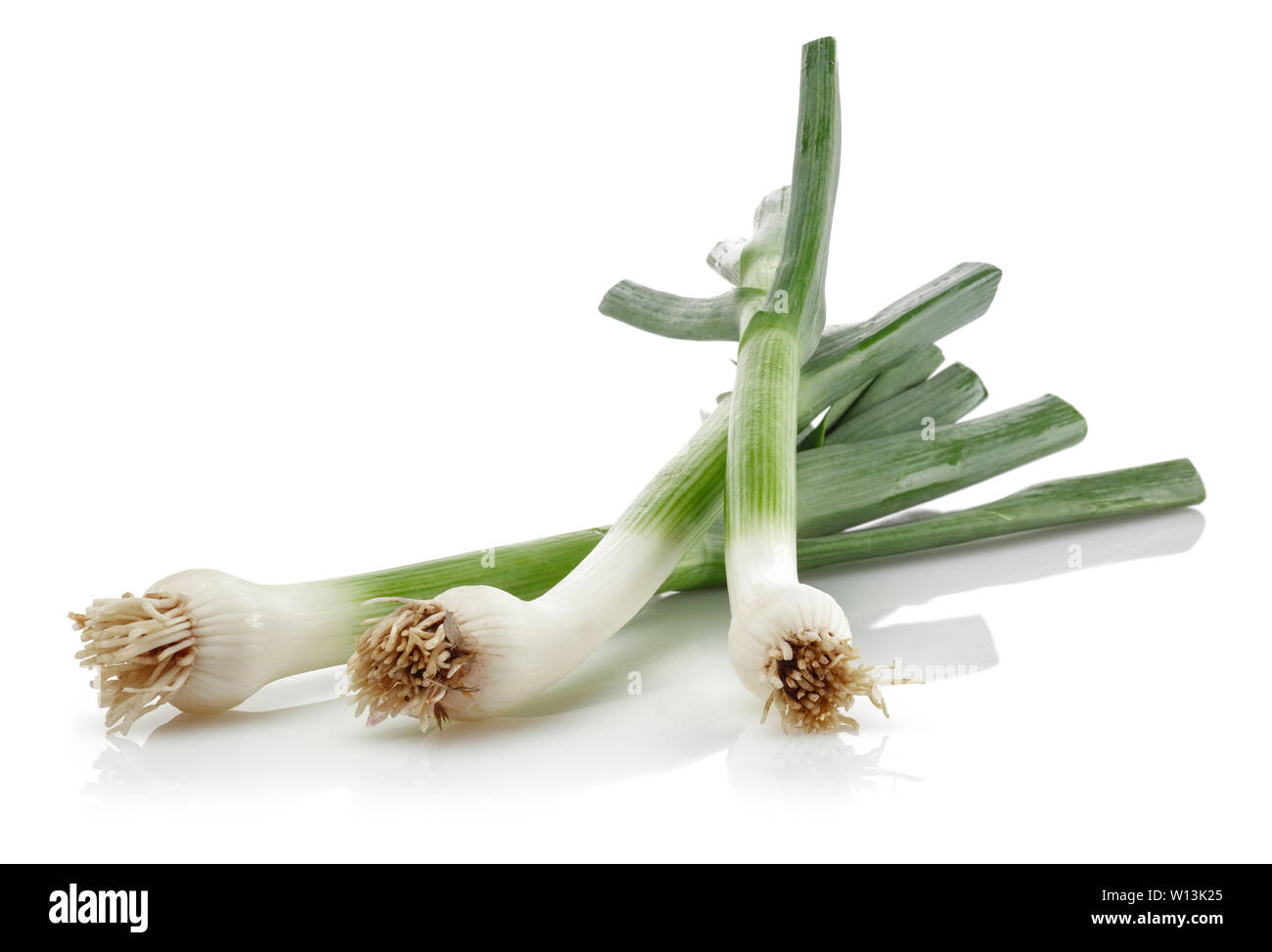Fresh green garlic isolated on white background Stock Photo - Alamy