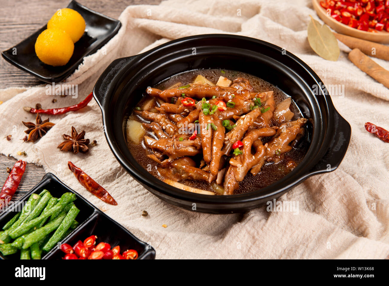 Spicy chicken claw cooker Stock Photo - Alamy