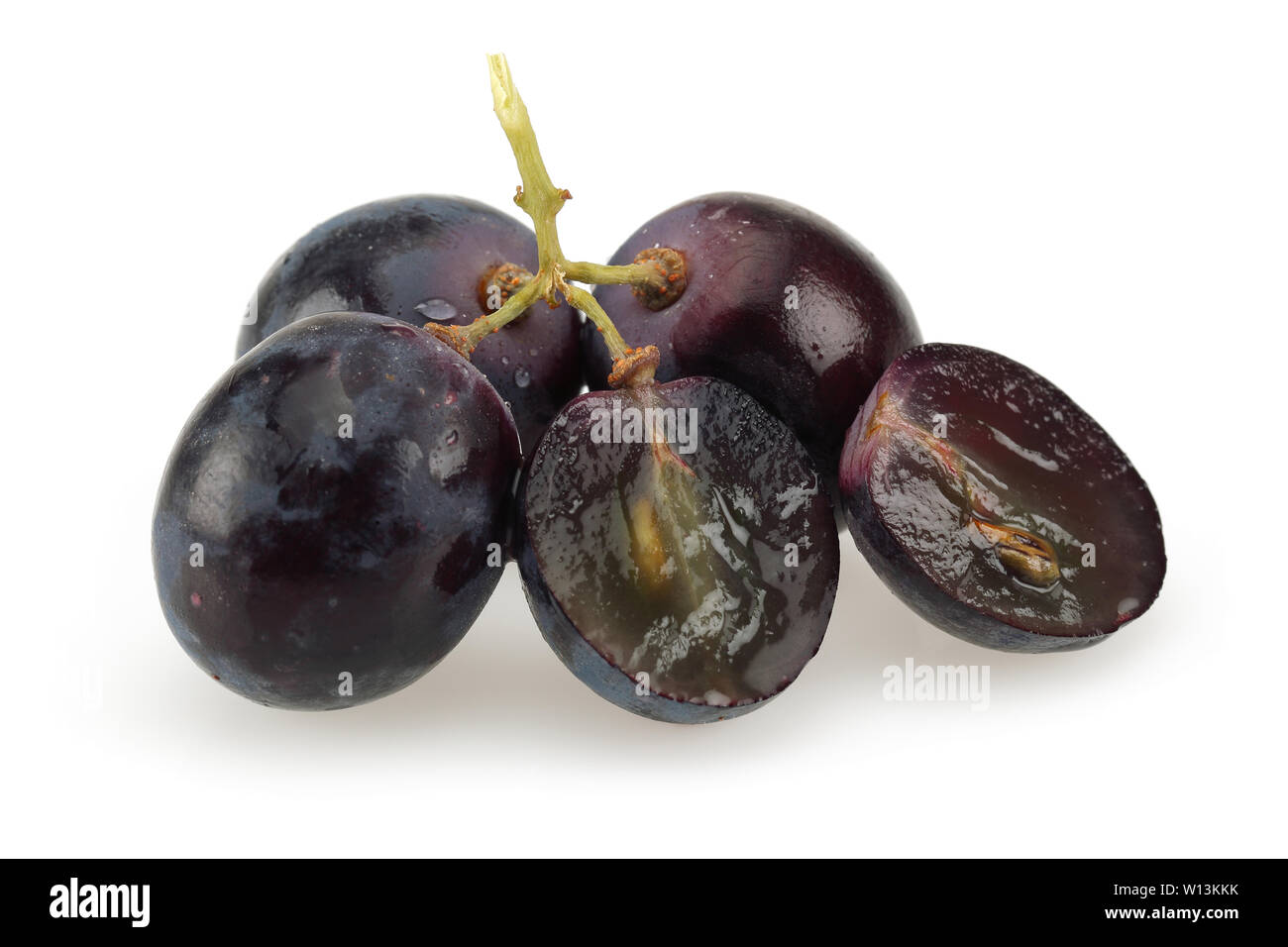 Fresh black grapes isolated on white background Stock Photo - Alamy