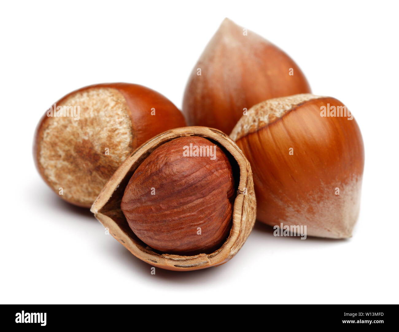 Whole and broken hazelnut isolated on white background Stock Photo - Alamy