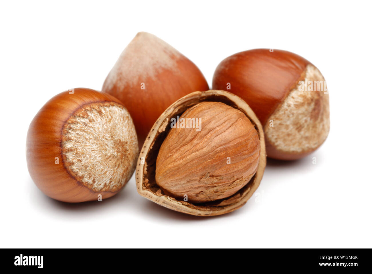 Whole and broken hazelnut isolated on white background Stock Photo - Alamy