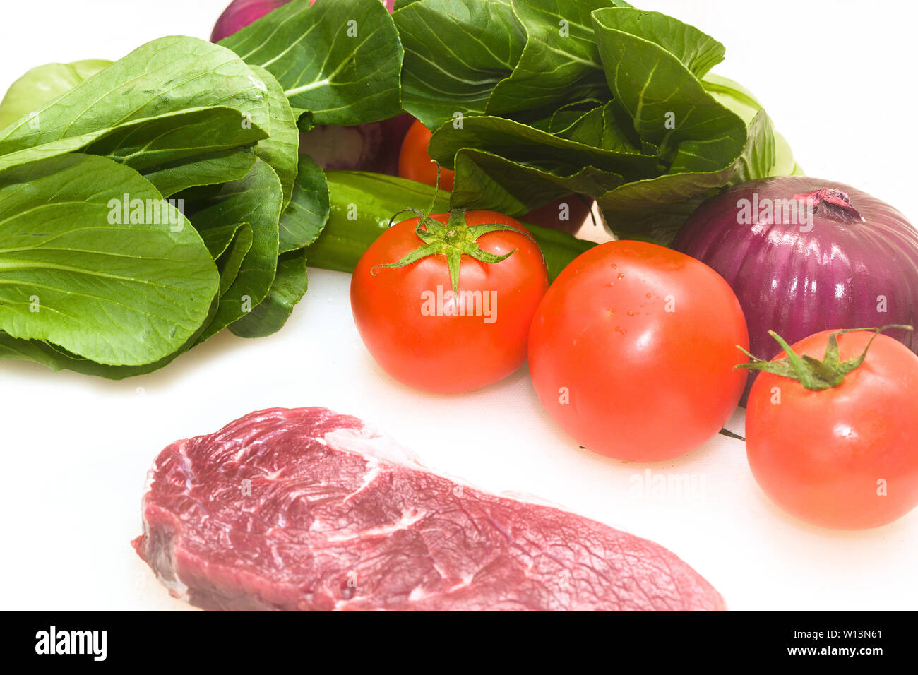 Fresh vegetables with raw beef sheds Stock Photo - Alamy