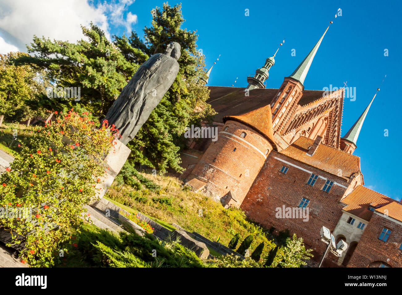 Nicolaus copernicus statue in background old cathedral - Frombork ...