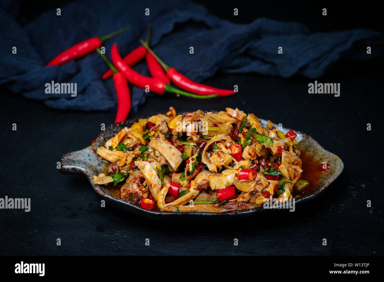 drooling chicken, stick chicken Stock Photo - Alamy