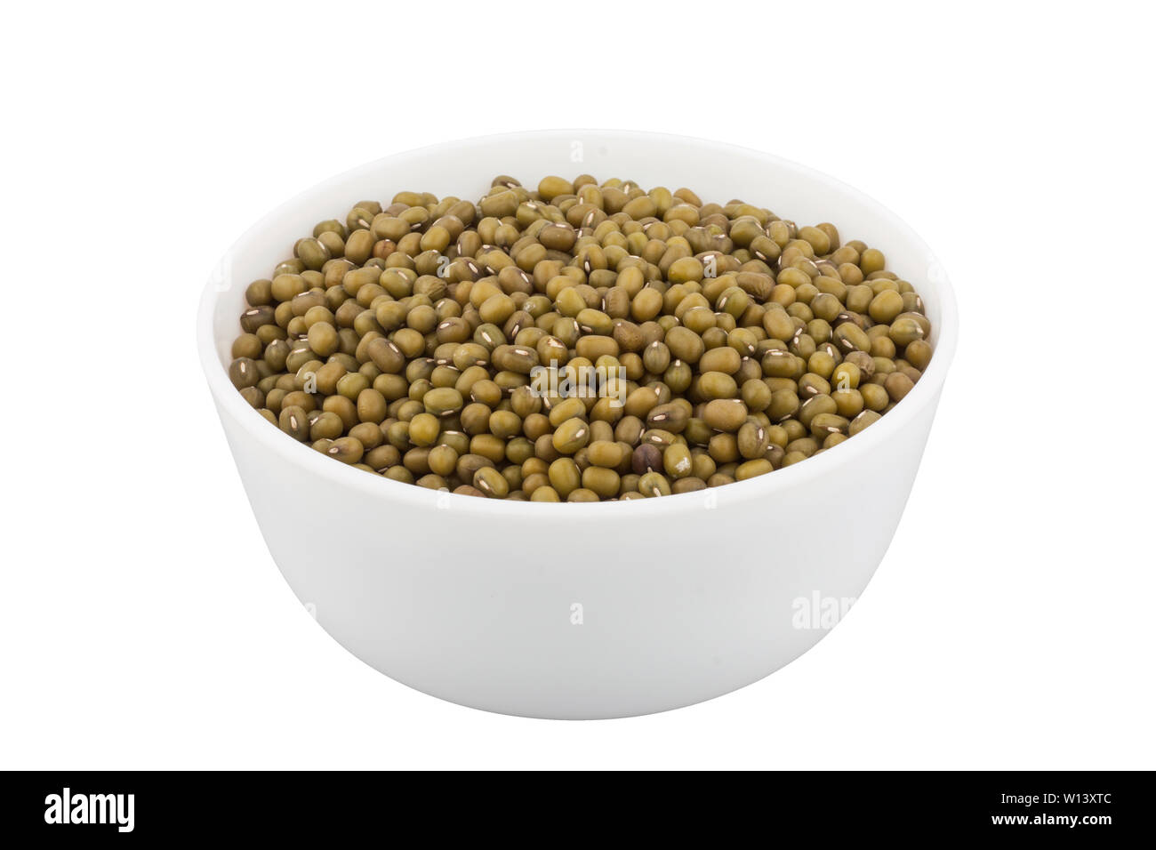 Green mung beans in bowl isolated on white background Stock Photo - Alamy