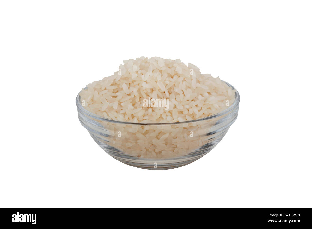 Rice in glass bowl isolated on white background Stock Photo - Alamy