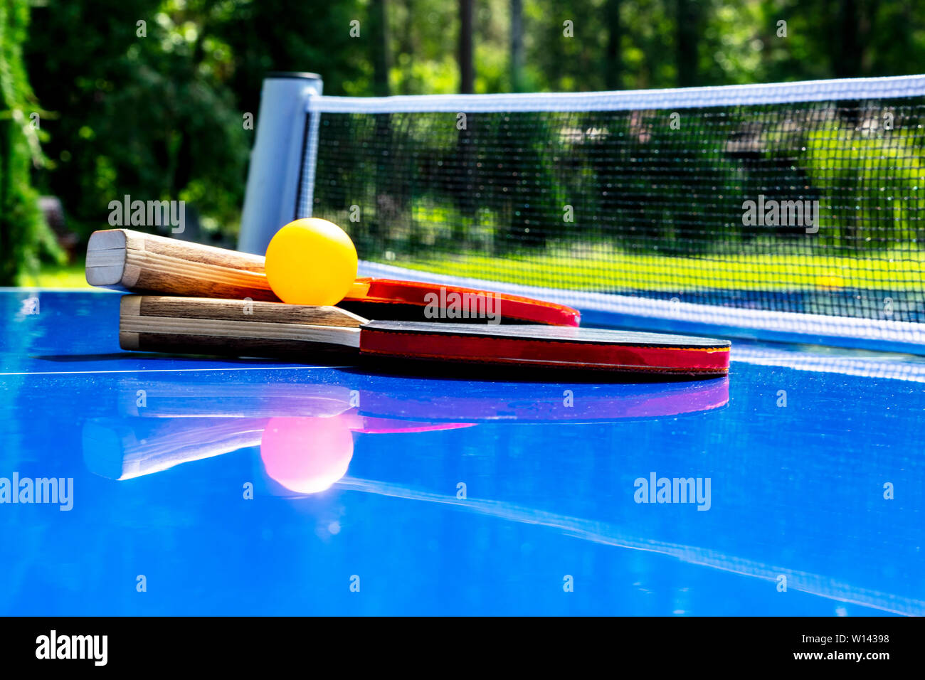 Blue table tennis or ping pong. Close-up ping-pong net. Close up ping ...