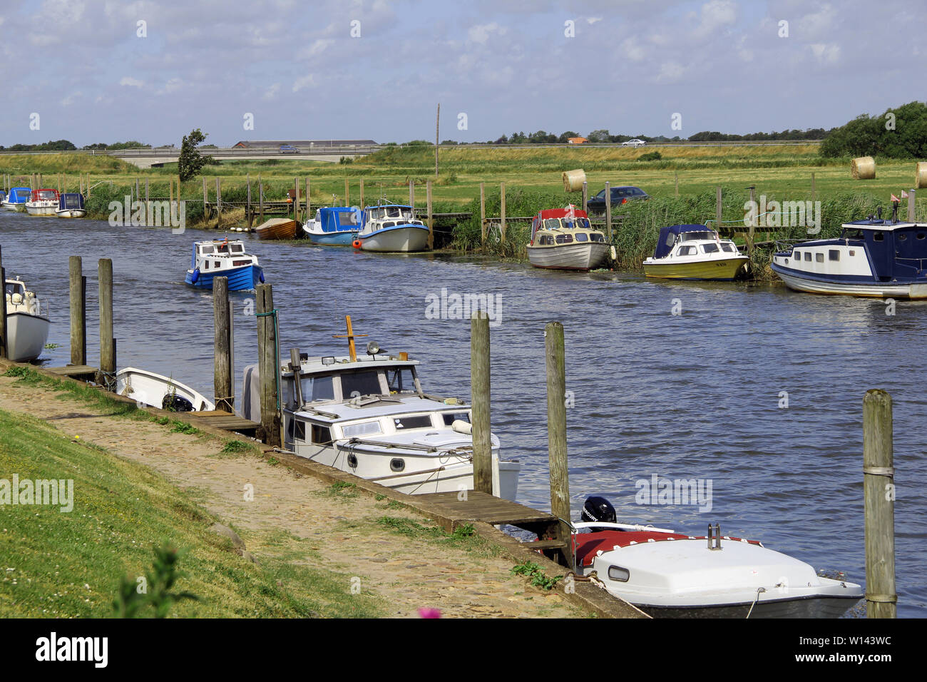 Colorful small ships in a small river in Danmark Stock Photo - Alamy