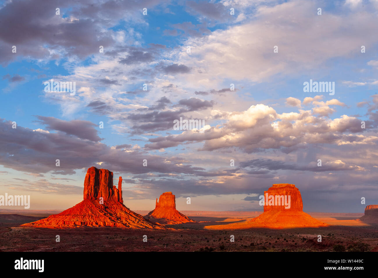 The famous Merrick and Mittens Buttes from monument valley basking in ...