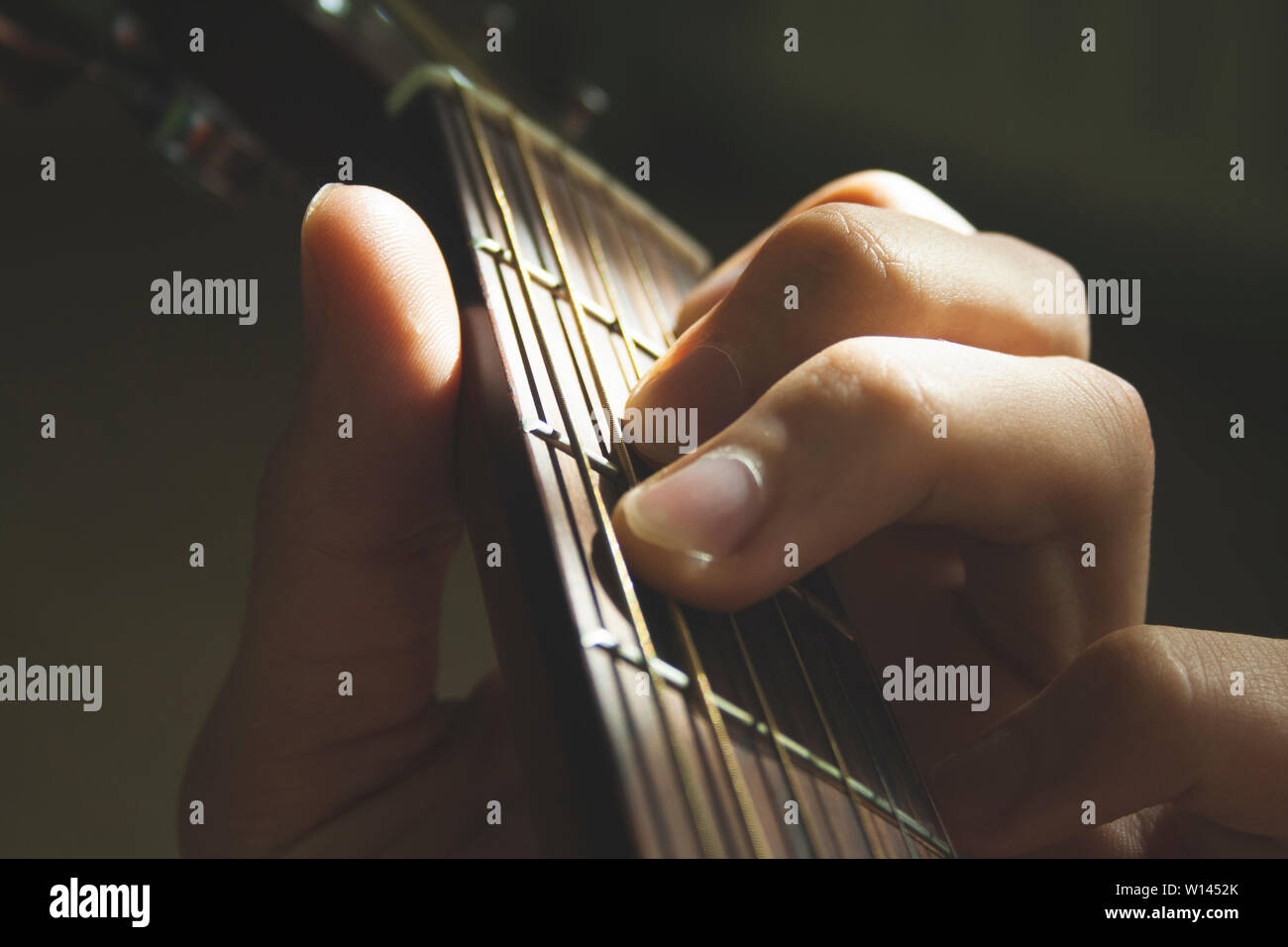 Mans hand playing acoustic guitar hi-res stock photography and images ...
