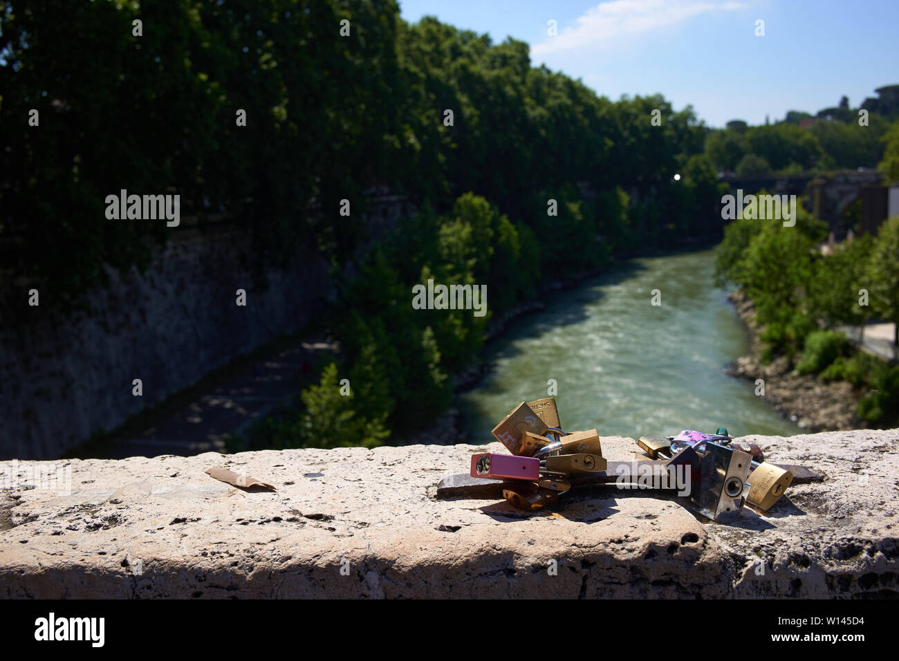 Padlocks on a bridge in Rome Stock Photo - Alamy