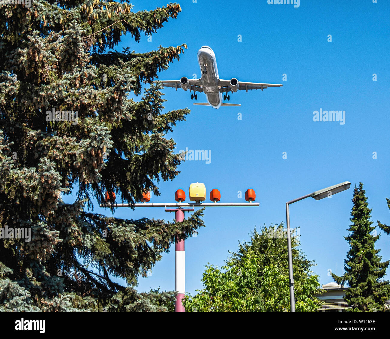 Plane in the air. Aeroplane approaching Tegel airport & coming in to ...