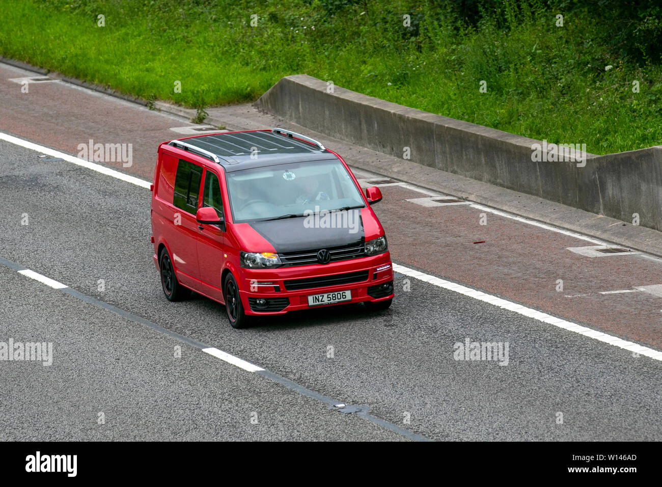 2006 red Volkswagen Transporter T30 174 TDI; M6, Lancaster, UK ...
